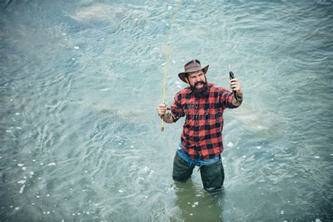 Excited Amazed Fisher Man In Water Catching Trout Fish Top View Young