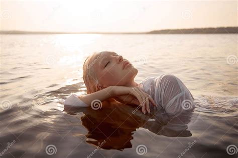 Nude Naked Woman In Water At Sunset Beautiful Blonde Woman With Short