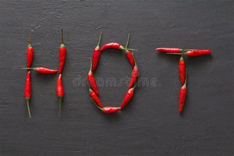 Word Sex Red Hot Chili Peppers On Black Background On Black Table Swx