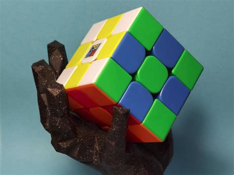 Low Poly Hand Rubiks Cube Holder Remixed By Mishan Makerworld Download Free 3d Models