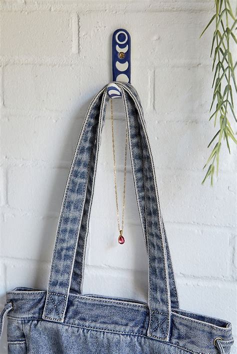 Cassie Moon Phase Wall Hook Urban Outfitters Uk