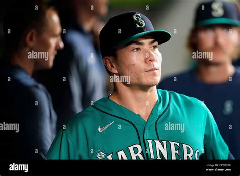 Seattle Mariners Starting Pitcher Bryan Woo Walks In The Dugout After