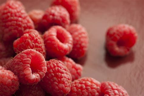 Free Image Of Vibrant Pile Of Red Raspberries Freebiephotography