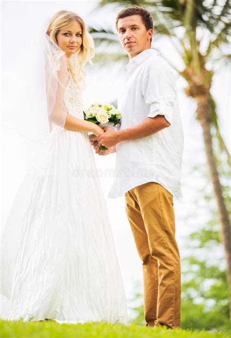 Bride And Groom Romantic Newly Married Couple On The Beach Just