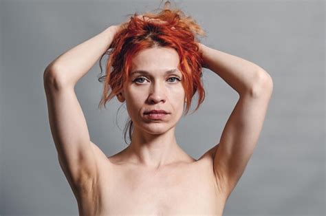 Premium Photo Red Naked Woman Hands Near Hair Blue Eyes Relax Front