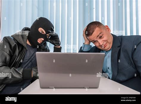 The Extortionist Thief Demands Money In The Businessmans Office Theft