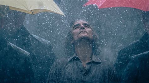 New Photo From Joker Folie Deux Of Joaquin Phoenix Enjoying The Rain