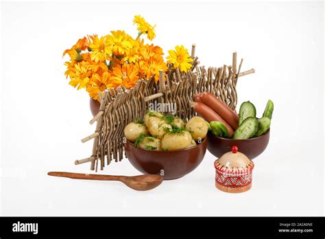 Potatoes Greenery And Tableware On Isolated Satudio Background Stock