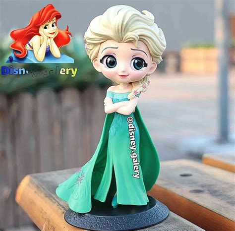 خرید و قیمت فیگور پرنسس السا مدل لباس سبز فروزن برند کیو پاسکت Elsa Frozen Figure دیزنی گالری