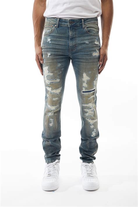 Ripped And Repaired Denim Jeans In Cobalt Msociety