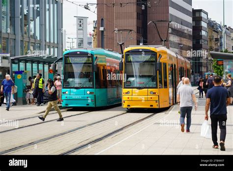 People At A Tram Stop Waiting For Their Connection Stock Photo Alamy