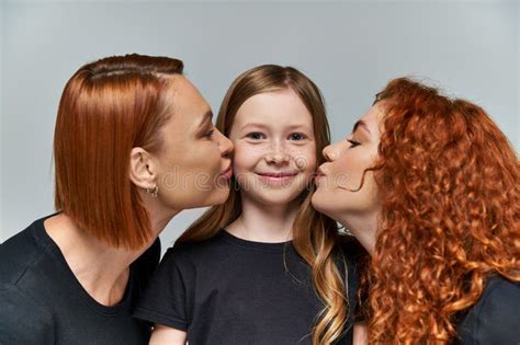 Redhead Man Kissing Forehead Of Happy Stock Photo Image Of Tender People