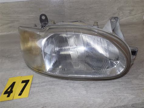 FORD ESCORT MK 7 Reflektor Lampa Prawa