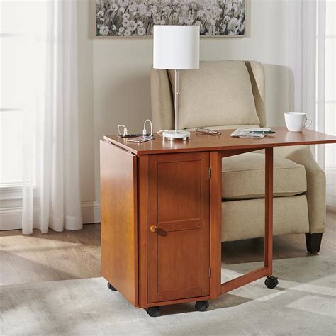 The Device Charging Dropleaf End Table Hammacher Schlemmer