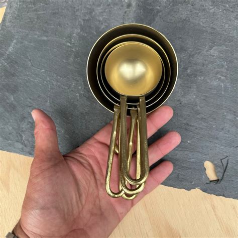 Brass Measuring Cups Set Of Four Upstate Mn