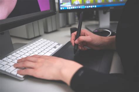 Premium Photo Female Hands Using Keyboard And Graphic Tablet Close Up