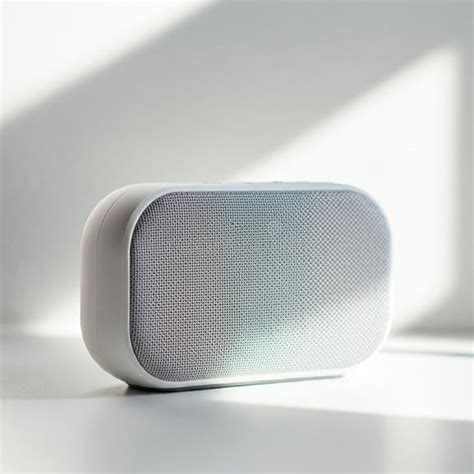 A Compact Rectangular Wireless Speaker With Rounded Edges Positioned