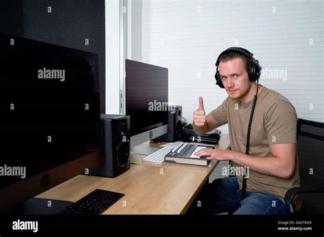 Sound Engineer Check The Correctness Of The Audio Recorder Before