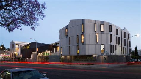 Tighe Architecture Creates Sculptural Grey Apartment Building For La