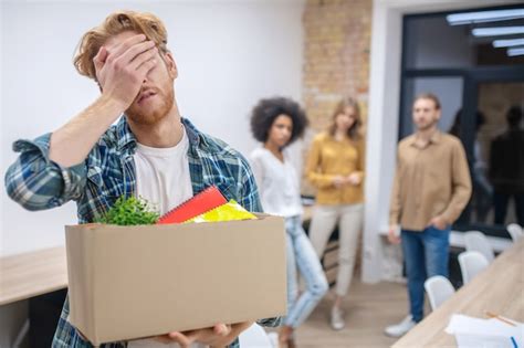 Premium Photo Job Loss Ginger Guy Looking Frustrated After Loosing Job