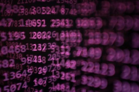 premium photo full frame shot of pink binary codes on screen