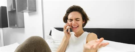 Free Photo Happy Young Woman Calling Friend Chatting Over The Phone