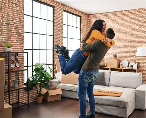 Premium Photo Man And Woman Couple Hugging Each Other Standing At New