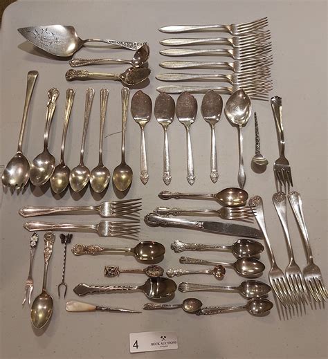 Collection Of Silver Plate Cutlery And Serving Utensils Including Jelly