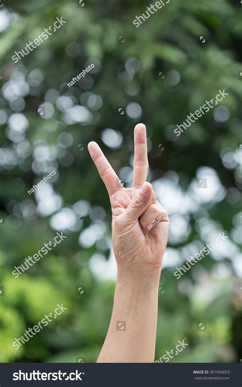 Hand Two Fingers Upvictory Symbol On Stock Photo 301956653 Shutterstock