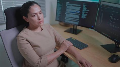 Close Up Of A Self Employed Woman Sitting And Writing Code Discouraged