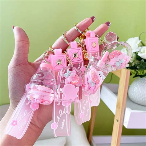 창의적인 핑크 도넛 퀵샌드 병 키 체인 퀵샌드 핑크 밀크 티 컵 아크릴 키 체인 여성 가방 자동차 매력 열쇠 고리 선물 Aliexpress