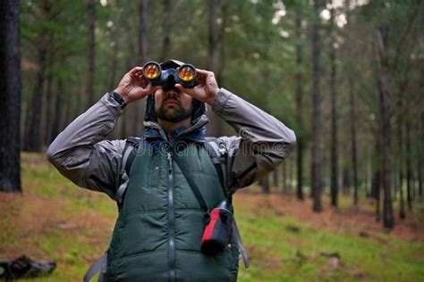 Bird Watcher On The Hunt Handsome Man Using His Binoculars To Scan The