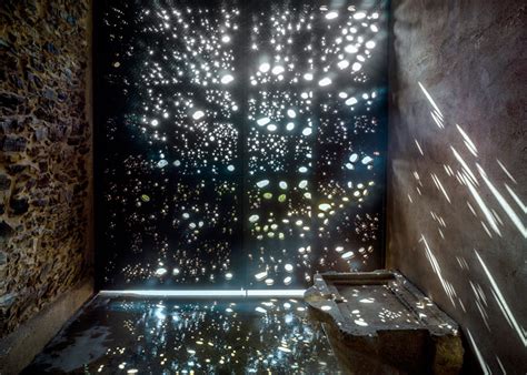 Weathered Steel And Stone Combine In Zest Architectures Restored Farmhouse