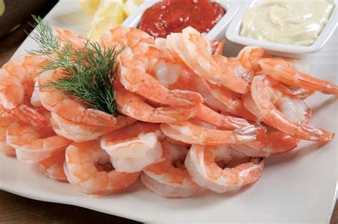 Shrimp Cocktail With Lemon Wedges And Fork Prepared Food Photos