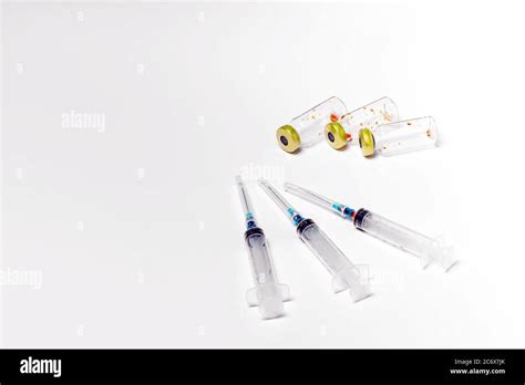 Used Medical Vials And Hypodermic Syringes Isolated On White Background Treatment Cure