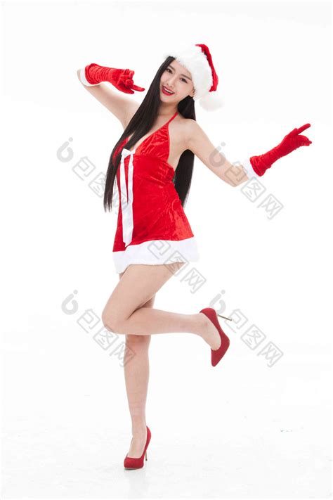 穿圣诞服的年轻女人图片 包图网企业站