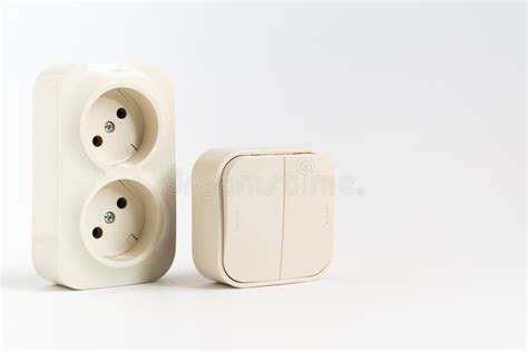 Double Socket And Two Key Light Switch On White Background Editorial Photography Image Of