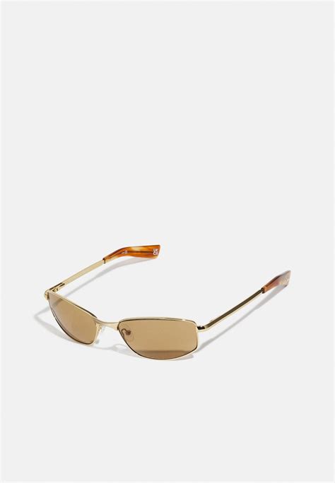 Le Specs Star Beam Unisex Zonnebril Bright Gold Coloured
