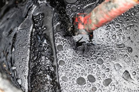 Premium Photo Bituminous Mastic For Waterproofing In A Bucket