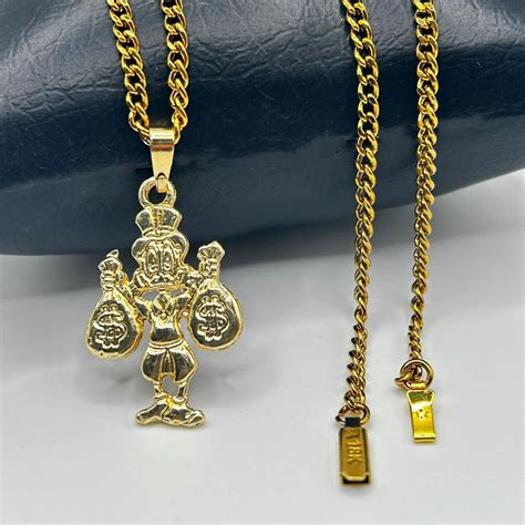 Corrente Cordão Grumet Em Moeda Antiga Banho de ouro pingente Tio Patinhas Coringa Shopee Brasil