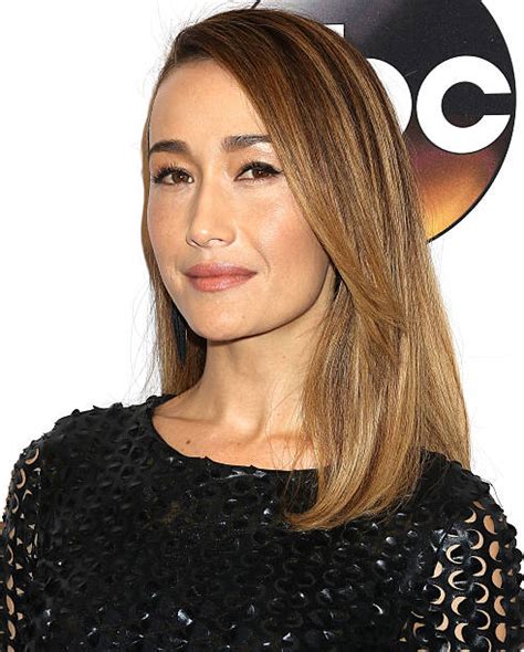 Maggie Q Visits The Empire State Building Photos And Images Getty Images