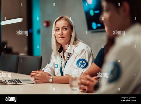 Group Of Female Security Operators Working In A Data System Control Room Technical Operators