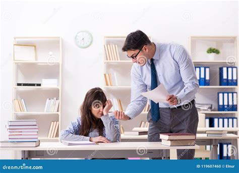 The Male Lecturer Giving Lecture To Female Babe Stock Photo Image Of Girl Learning