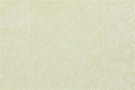 베이지색 회 반죽 벽 텍스처입니다 원활한 표면 및 추상 단색 배경입니다 창백하게 칠해진 벽체 구조 프리미엄 사진