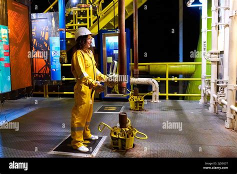 Installation Showing The Process Of Drilling An Oil Well Woman In Worker Suit On Site Kuala
