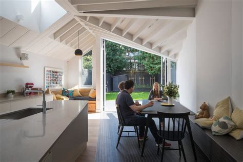 Angular Doors Connect Tapered Extension By Mustard Architects With Patio