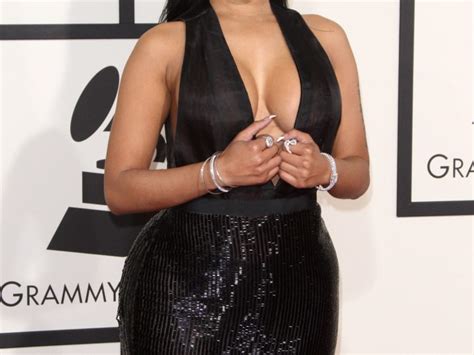 Nicki Minaj Grabs Breast Makes Oral Sex Symbol In Naughty New Twit