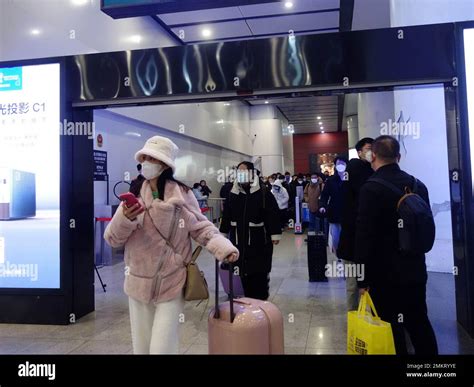 Beijing China January 29 2023 Passengers Walk Out Of The Beijing