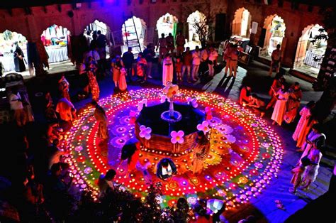 People Are Lighting Earthen Lamps At The Inauguration Of The Deepotsav Fair