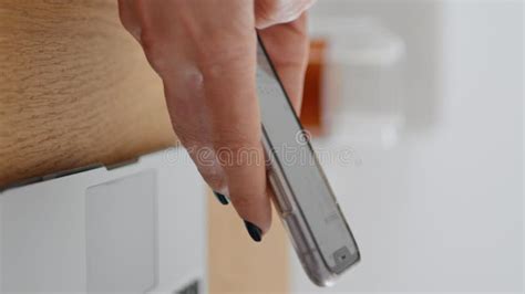 Woman Hands Texting Phone Message In Workplace Vertically Closeup Lady